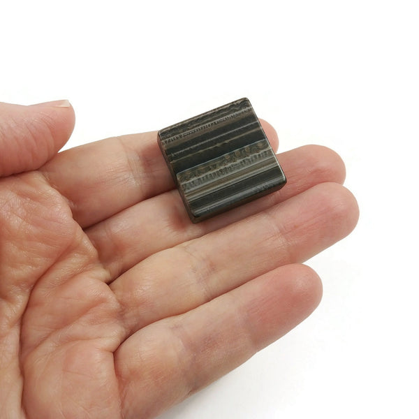 Resin and plastic sewing buttons